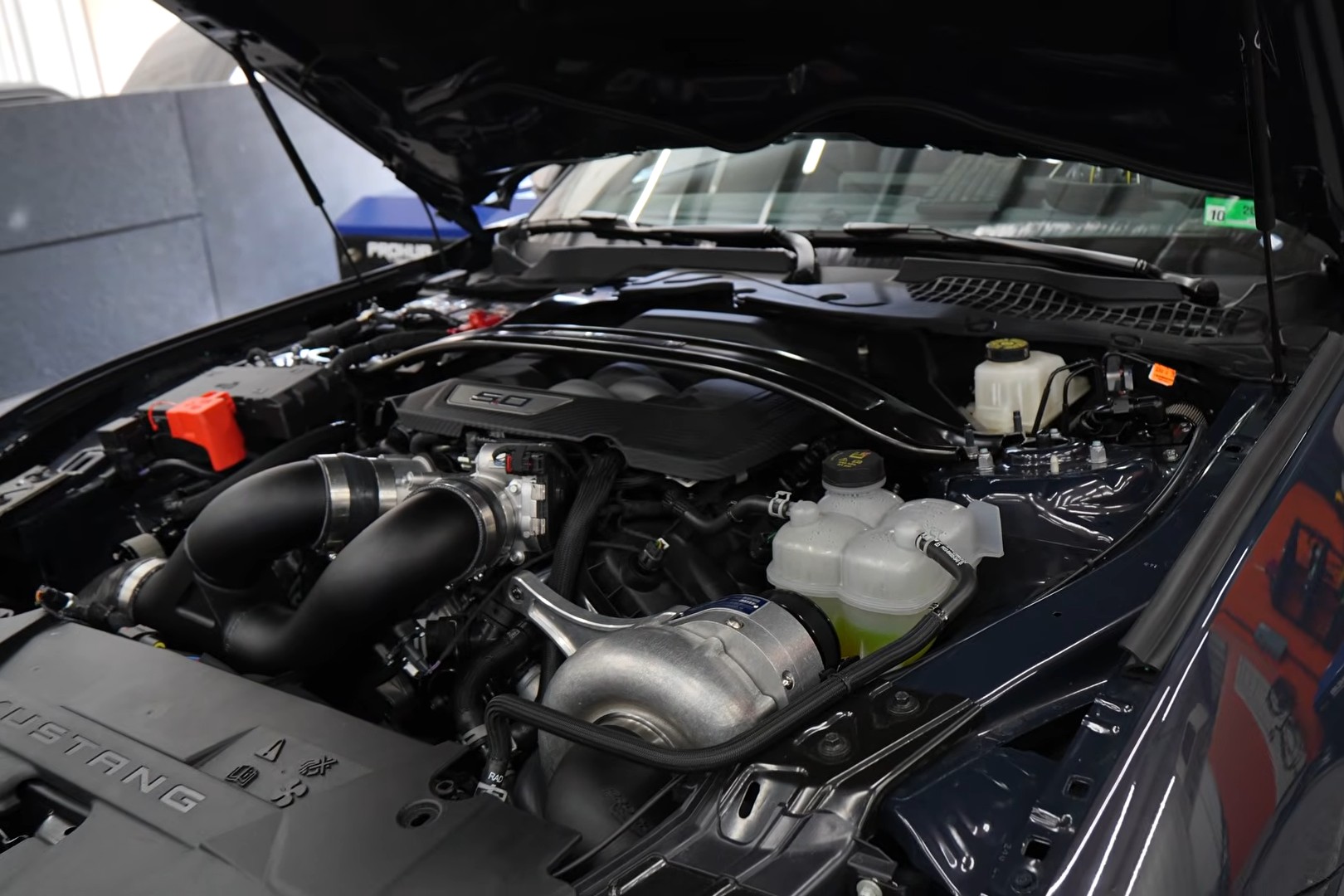 Bolt-On ProCharger Pushes A 1,700-Mile Dark Horse Past 740 HP